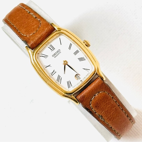 Seiko | Accessories | Vintage Seiko Womens Tank Date Watch Gold Tan Brown Leather Roman 3y95a0 ...